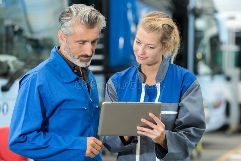 Worker Man and Woman Standing with Tablet Stock Photo - Image of ...