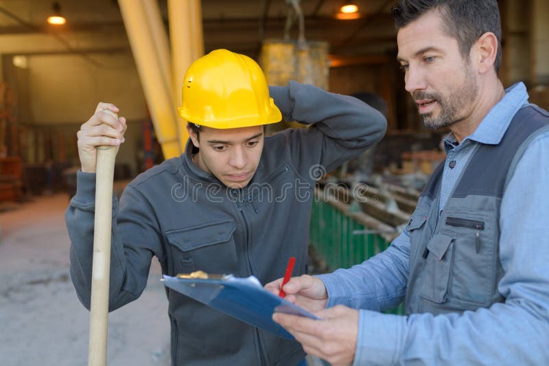 Worker with Manager Inspecting Industrial Area Stock Image - Image of ...