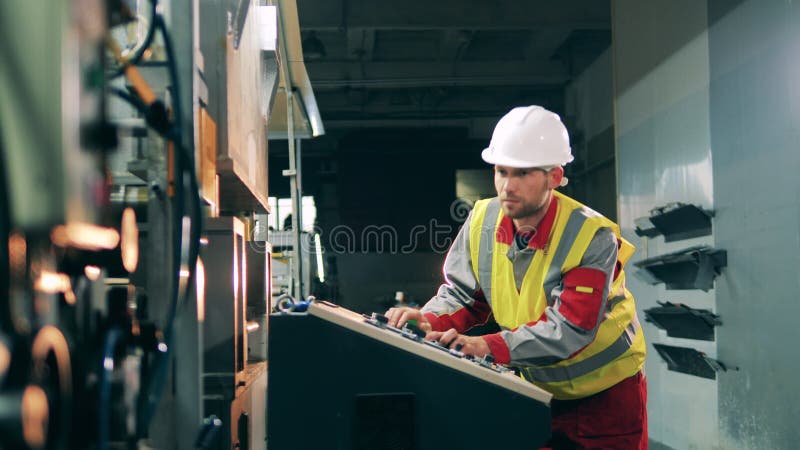 Worker Manages Production Process Using CNC Machine Stock Footage ...