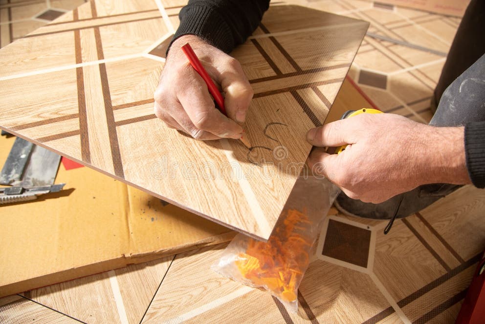 Worker Marking Ceramic Tile with Pencil Stock Photo - Image of home ...