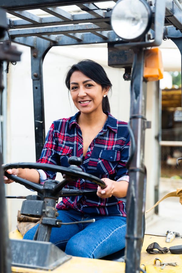 Worker of Materials Warehouse Working on Forklift Truck Stock Photo ...