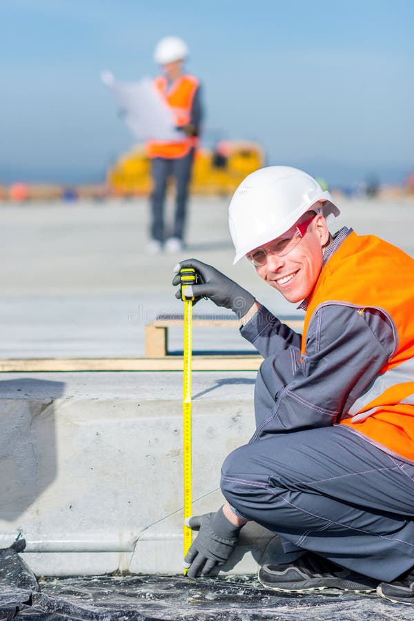 Worker Measure Construction Stock Photo - Image of labor, plan: 95650362