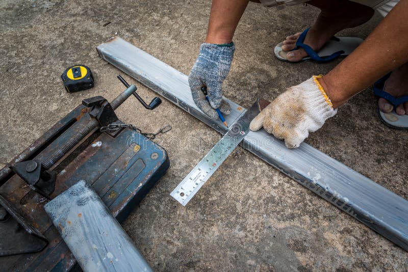 Worker Measurement the Steel with Square Triangle Scale Stock Image ...