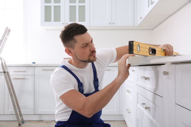 Worker Measuring Countertop Spirit Level Stock Photos - Free & Royalty ...