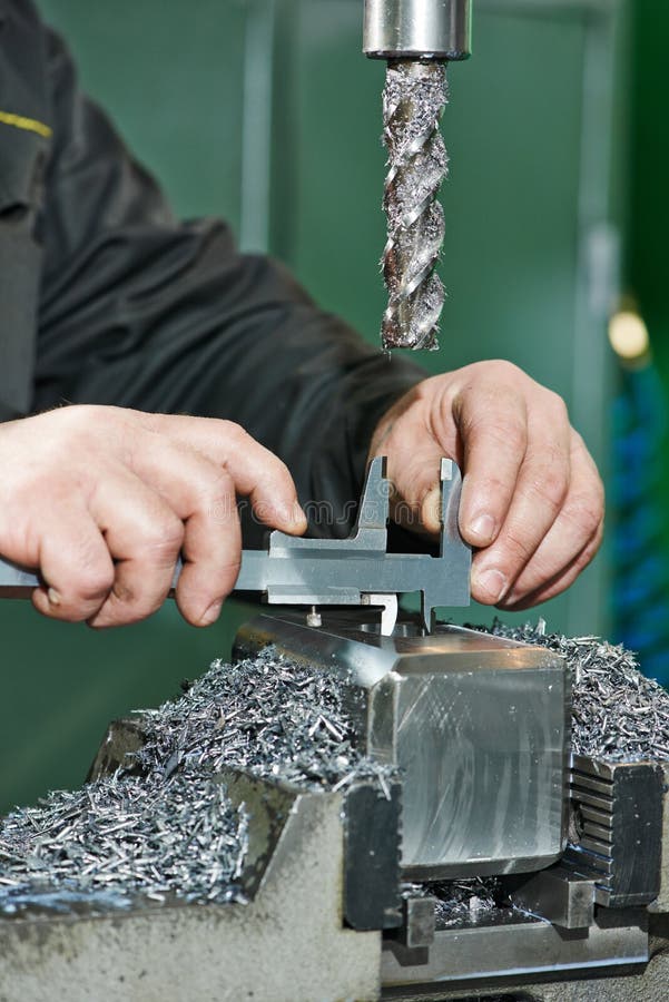 Worker Measuring Detail with Caliper Stock Photo - Image of detail ...