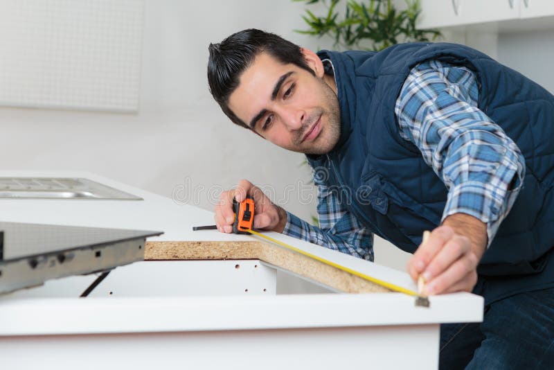 Worker Measuring Kitchen Workplace Stock Image - Image of measurement ...
