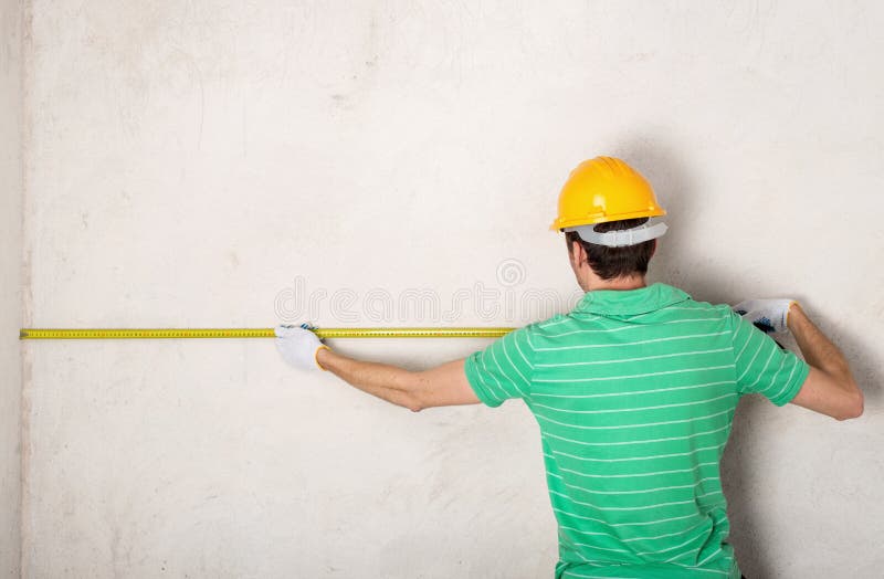Worker Measuring Plaster Wall Stock Photo - Image of glove ...