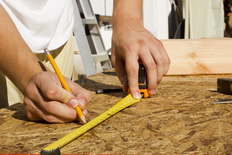 Carpenter or Joiner Measuring Wood Stock Image - Image of worker ...