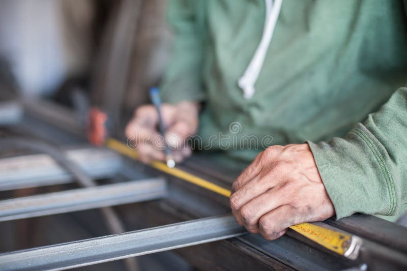 Worker Measuring Steel with Measuring Tape Stock Image - Image of ...