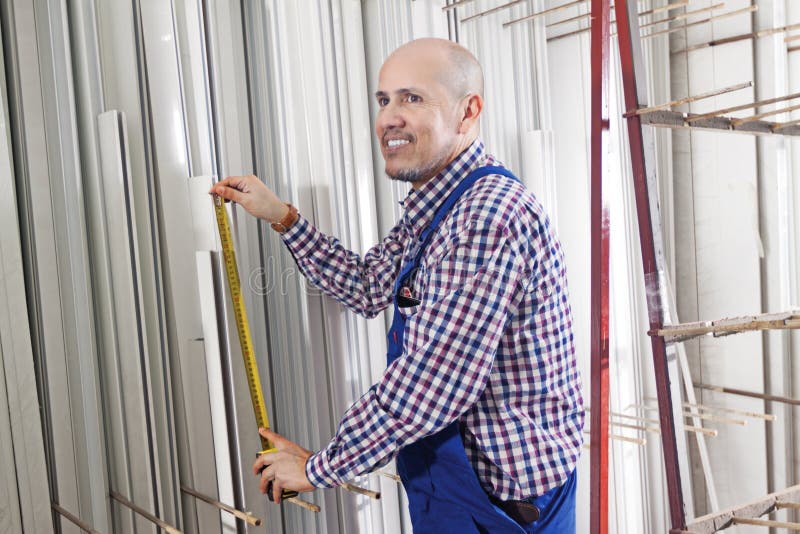 Worker Measuring Tape Pvc Profile Stock Photo - Image of crew ...
