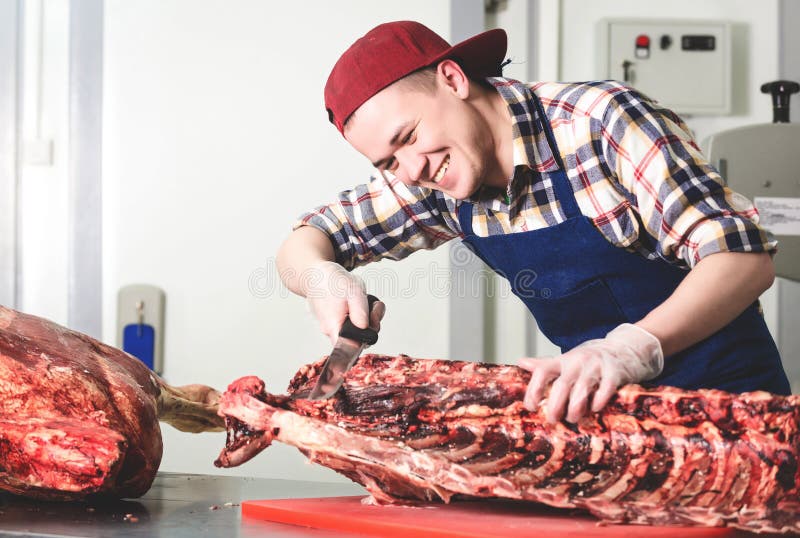 Worker at a meat factory stock image. Image of organic - 84832213