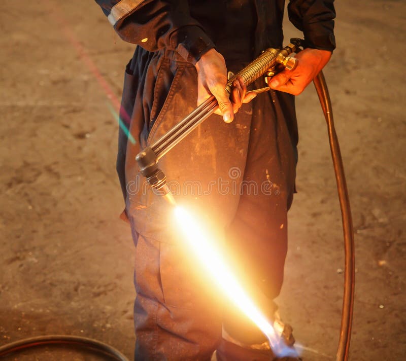 Worker with Metal Cutting Torch in Recycle Factory Stock Image - Image ...