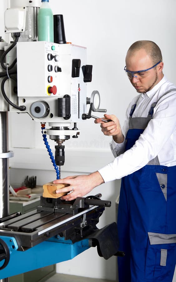 Worker at milling machine stock image. Image of mechanical - 28707407