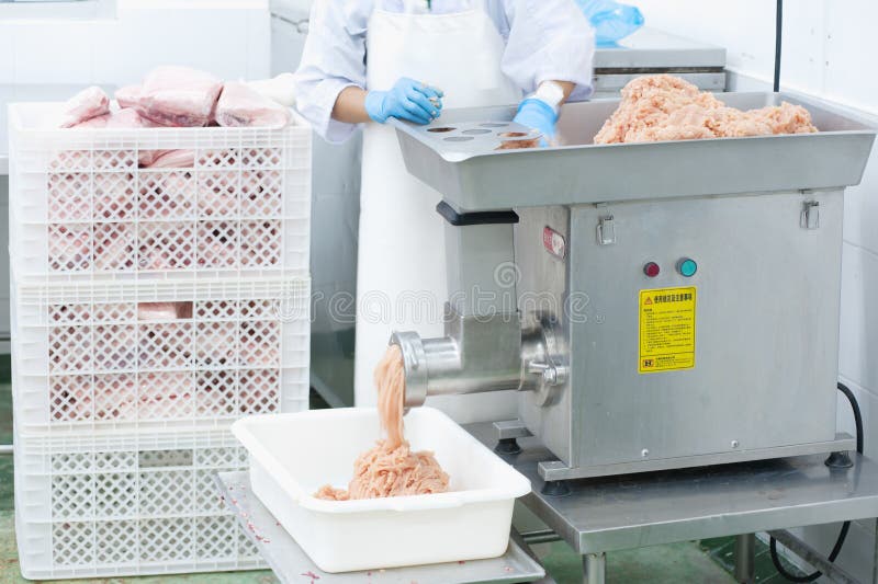 Worker Mincing Meat at Butcher Shop Stock Image - Image of machine ...