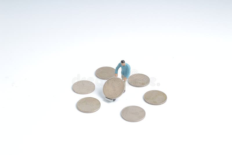 Worker Mini People Figure Pulling Silver Coin Stock Photo - Image of ...