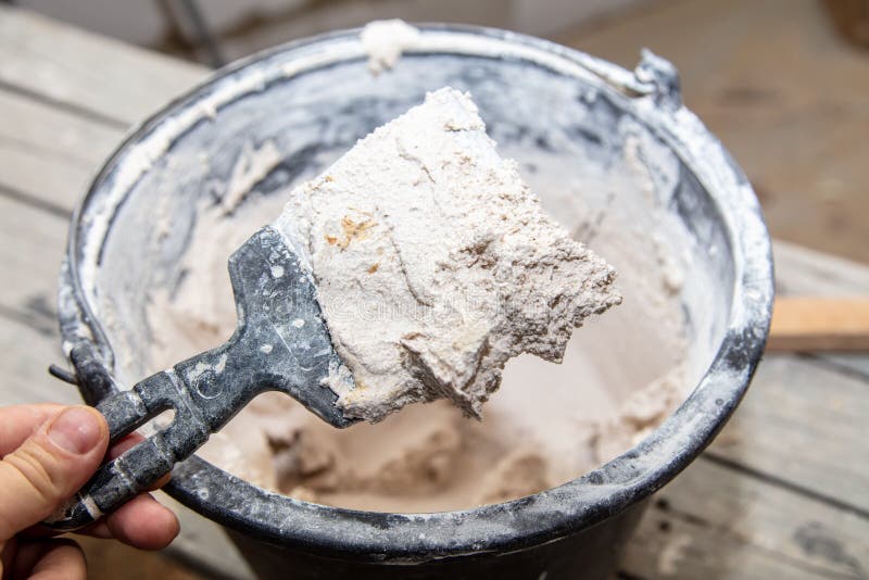 A Worker Mixes the Plaster Mix Stock Image - Image of grout, industrial ...