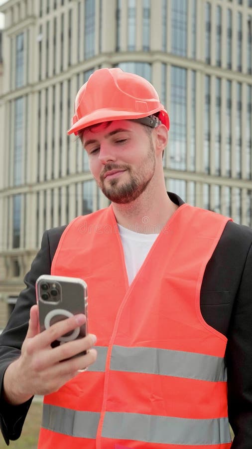 Worker with Modern Gadget Working at Construction Site Stock Image ...