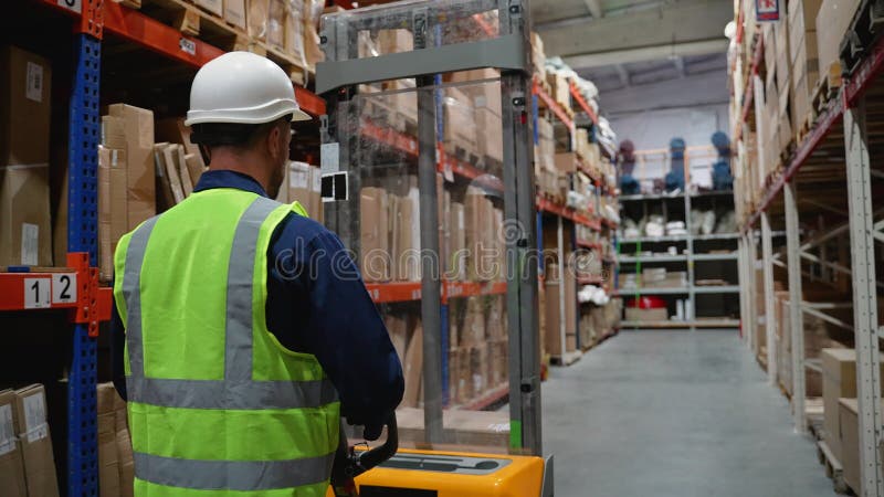 Worker Moving Goods on Forklift at Warehouse Stock Video - Video of ...