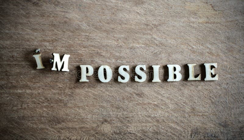 Worker Moving on the Word Impossible To Make Possible Stock Photo ...