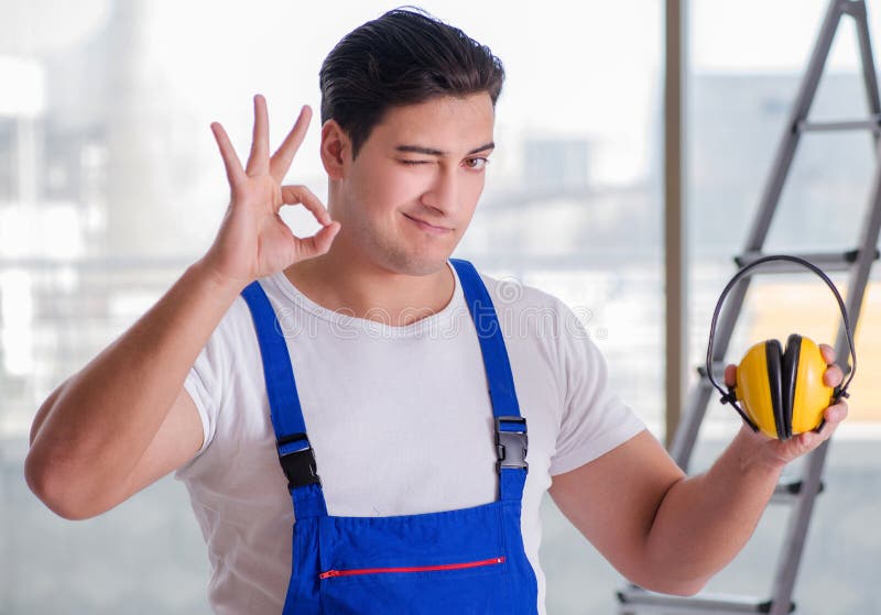 Worker with Noise Cancelling Headphones Stock Photo - Image of ...