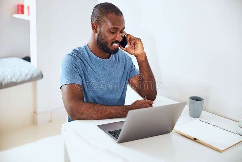 Businessman Making Notes To Notepad Looking Smartphone Stock Photos ...