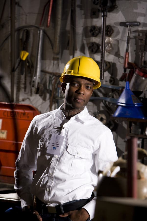 Worker in Office Maintenance Room Stock Image - Image of hard, looking ...