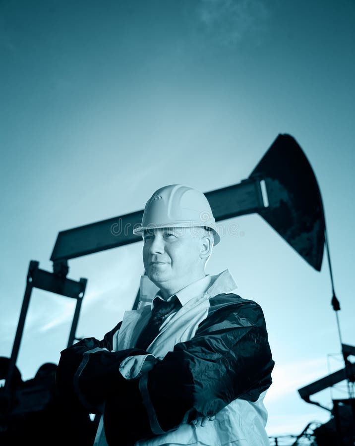 Engineer in an Oil field stock photo. Image of business - 21476144