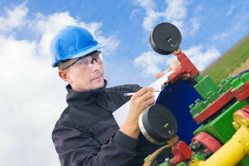 Worker on an oil pump stock photo. Image of crude, global - 64028010