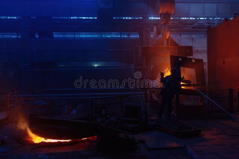 Worker Operates Metal Casting Process in Metallurgical Plant Stock ...