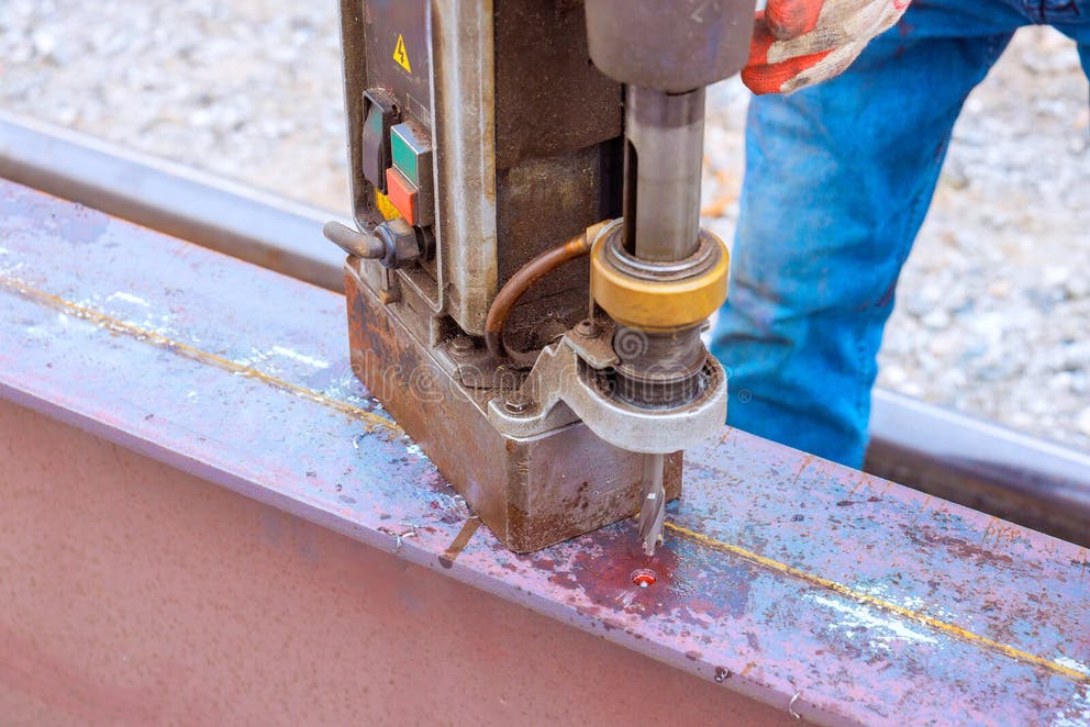 Worker Operates Metal Cutting Machine on Construction Site during ...