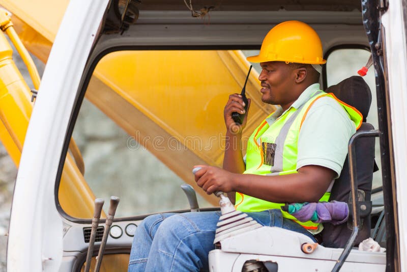 Worker operating bulldozer stock image. Image of male - 31347187