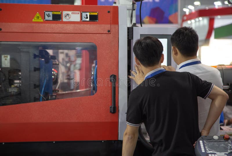 Worker Operate Plastic Injection Molding Press Machine Editorial Stock ...