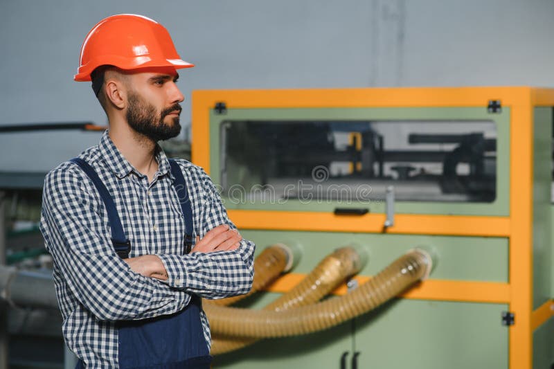 Worker Operating Machine in Factory Stock Photo - Image of craftsman ...