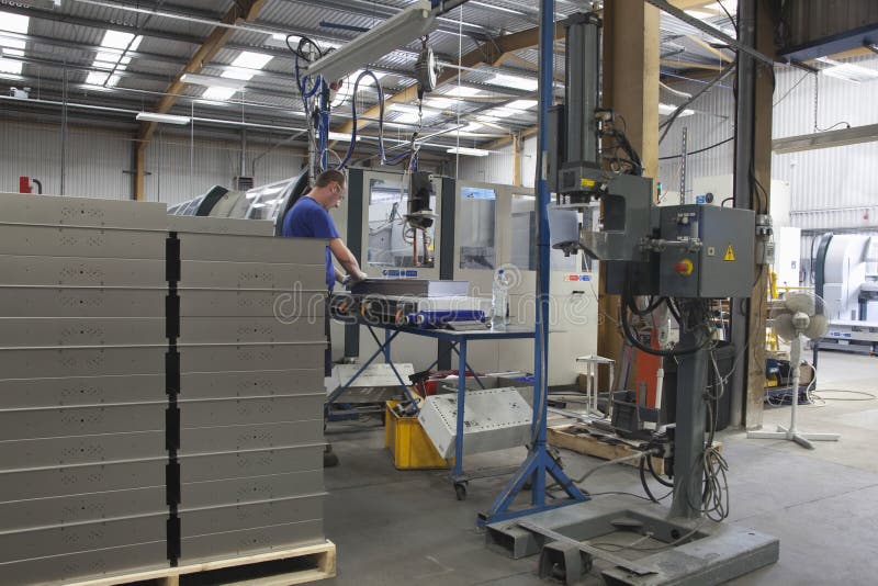 Worker Operating Machine stock photo. Image of line, horizontal - 33910680