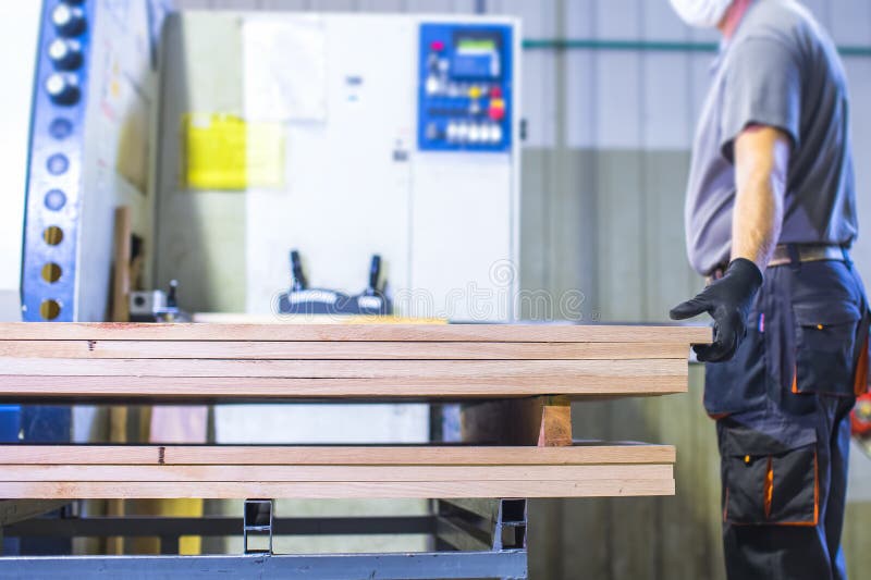 Worker Operating Machine in Wood Processing Facility Stock Image ...