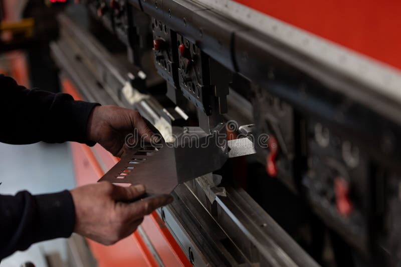 Worker Operating Metal Bending Machine in Industrial Setting Stock ...