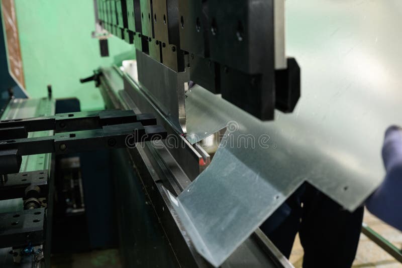Worker Operating Metal Press Machine at Workshop Stock Photo - Image of ...