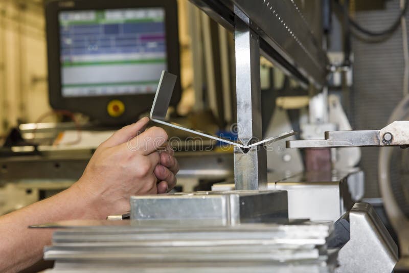 Worker Operating Metal Press Machine at Workshop Stock Photo - Image of ...