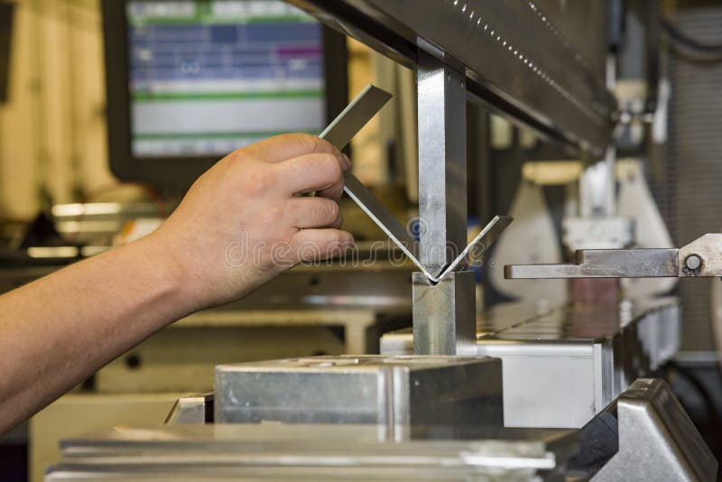 Worker Operating Metal Press Machine at Workshop Stock Image - Image of ...