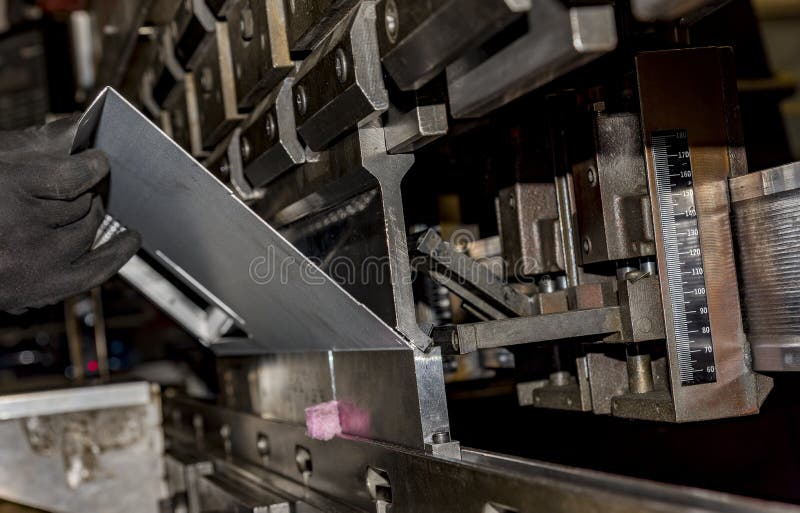 Worker Operating Metal Press Machine at Workshop Stock Photo - Image of ...