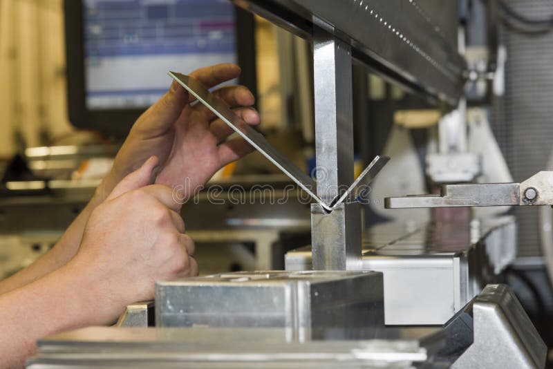 Worker Operating Metal Press Machine at Workshop Stock Photo - Image of ...