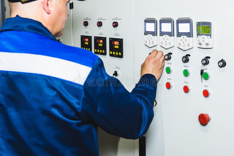 Hand Pressing on Green Button of the Machine in the Factory Stock Photo ...