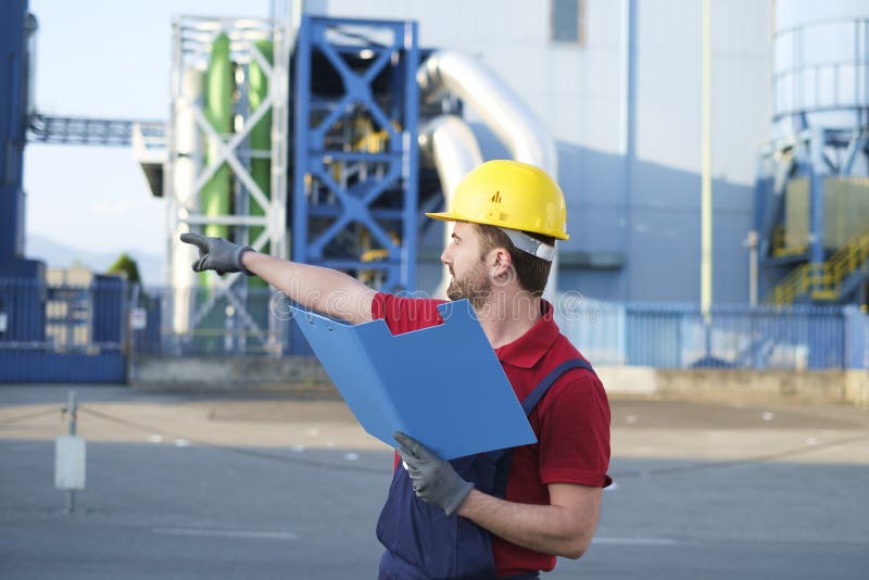 Worker outside factory stock image. Image of professional - 71069705