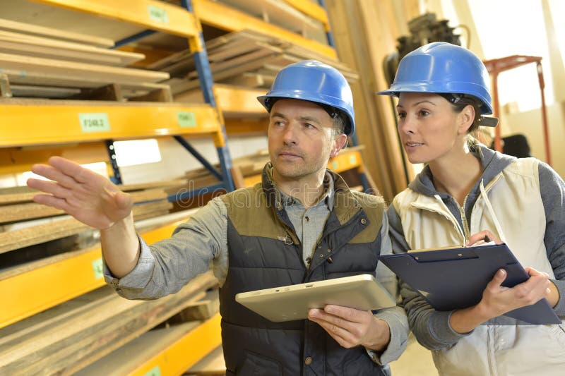 Worker with Overseer Controling Stock Stock Image - Image of ...