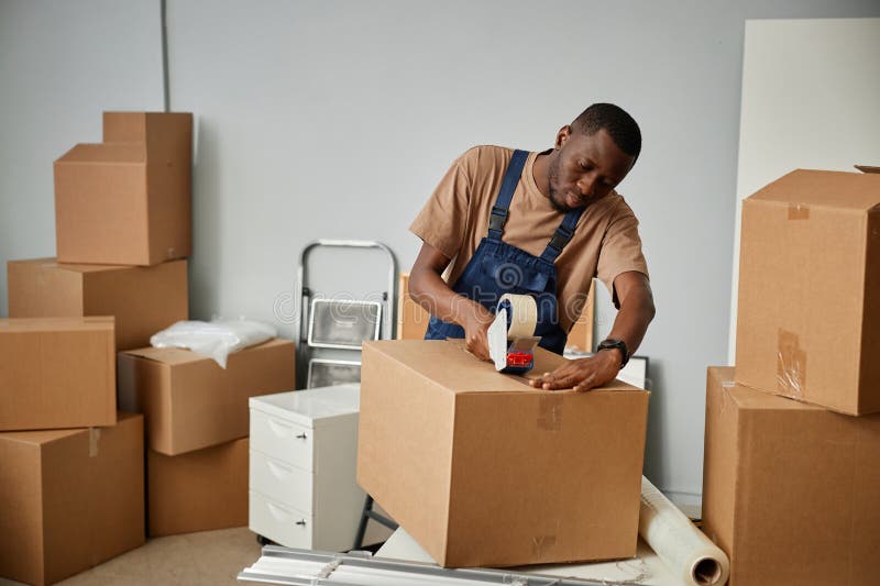 Worker Packing Boxes during Relocation Stock Image - Image of carton ...