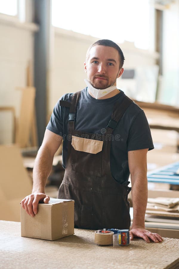 Worker Packing Boxes at Warehouse Stock Photo - Image of professional ...
