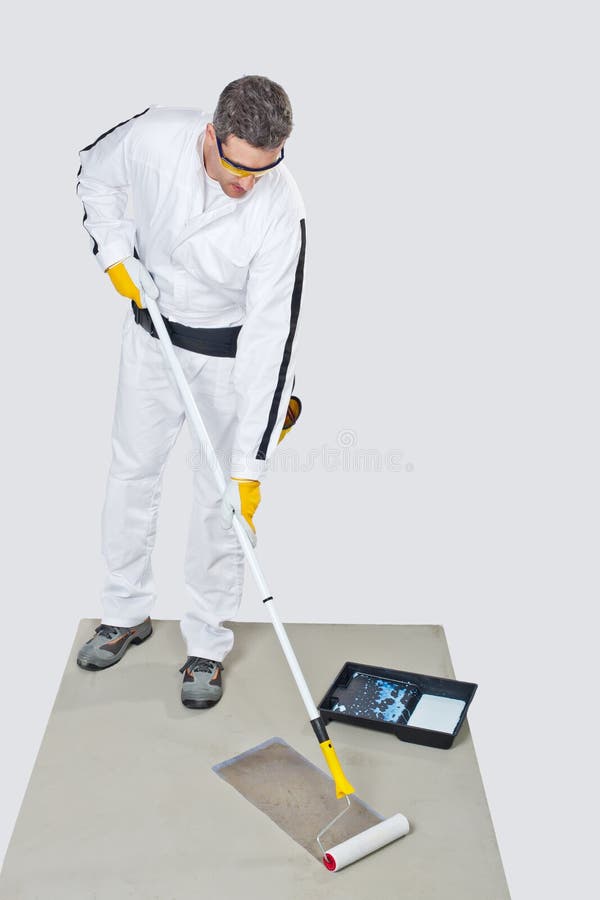 Worker with Paint Roller Primed Stock Image - Image of primer, indoors ...