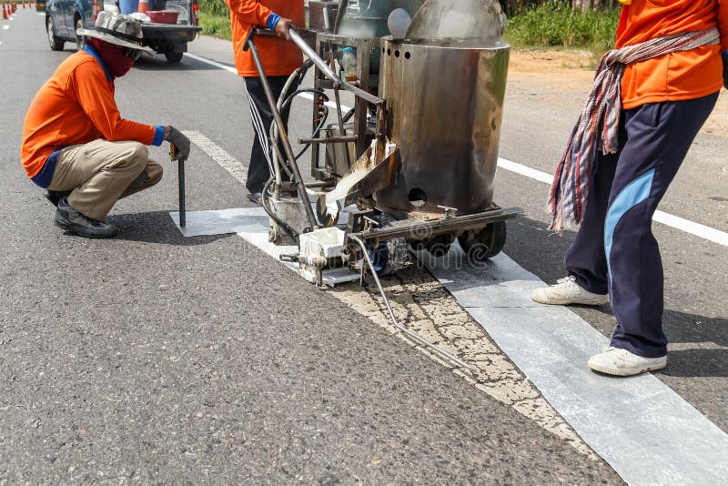 Worker and Painting Machine Work on the Street Editorial Photography ...