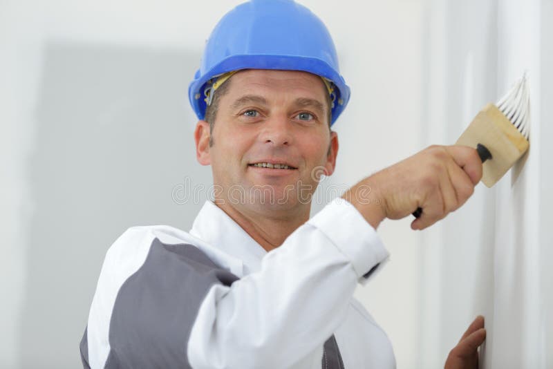 Worker Painting Wall in Room Stock Photo - Image of creative, decorator ...