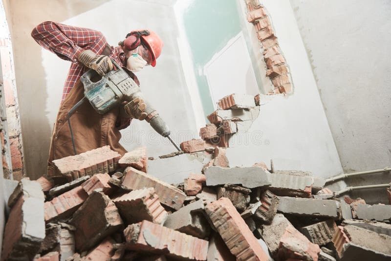 Worker with Demolition Hammer Breaking Interior Wall Stock Image ...